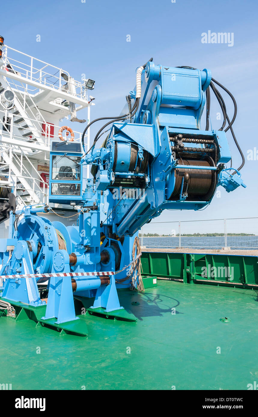 Blue industrial machine on a ship Stock Photo - Alamy