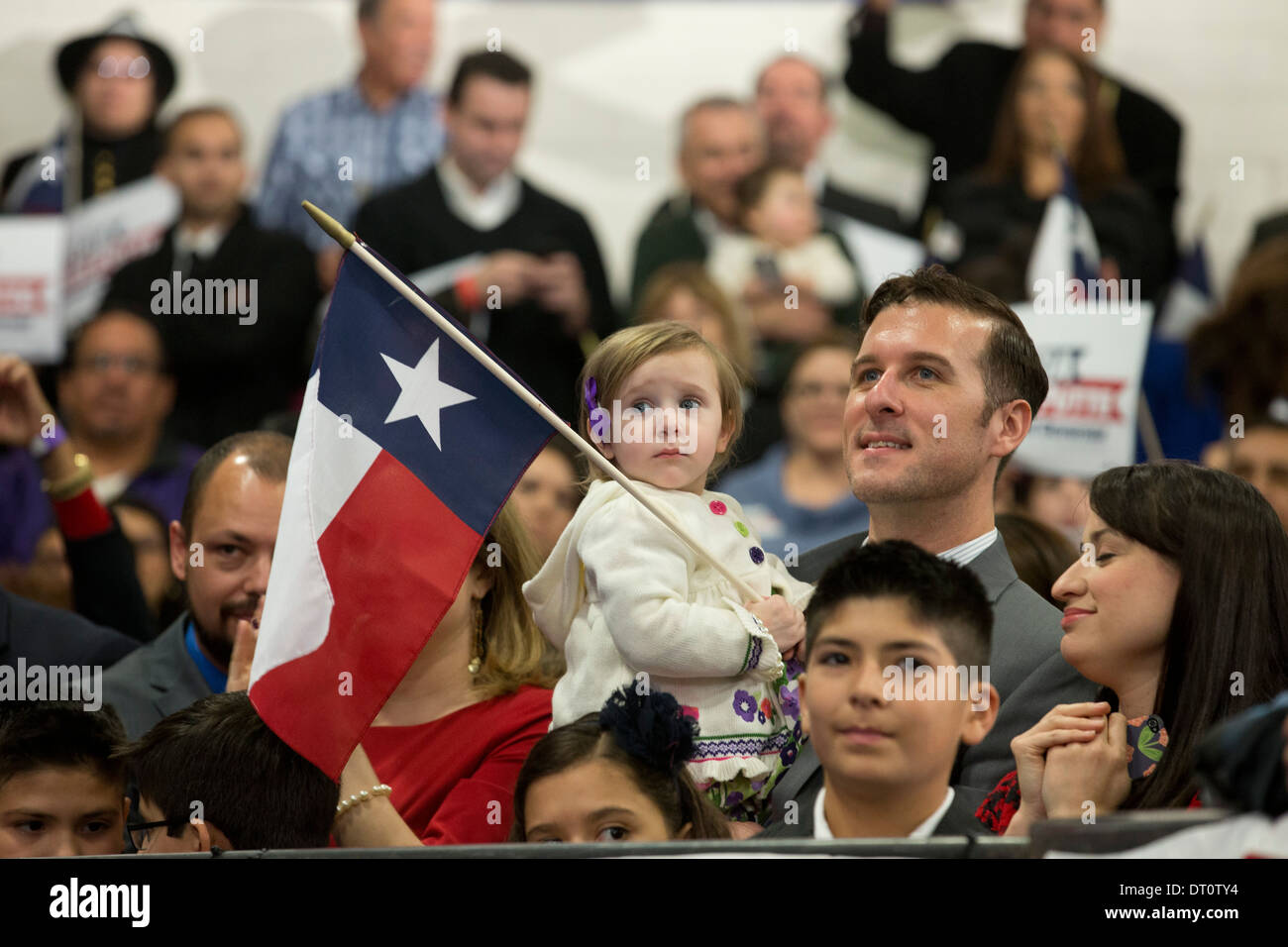 Child holds Texas flag while Democratic state Sen. Leticia Van de Putte ...