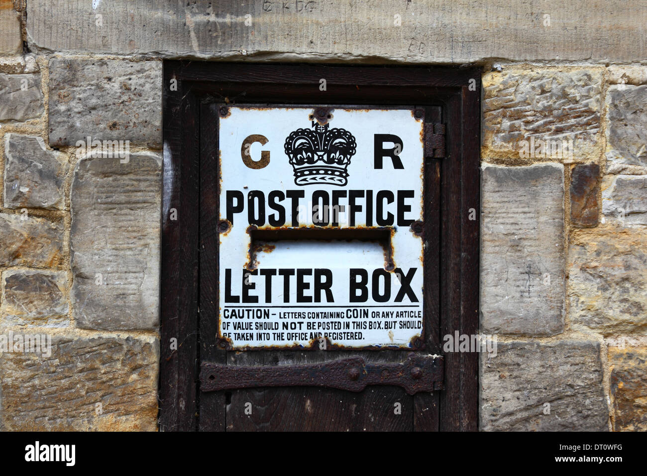 Historic Georgian Royal Mail post box in sandstone wall, Penshurst ...