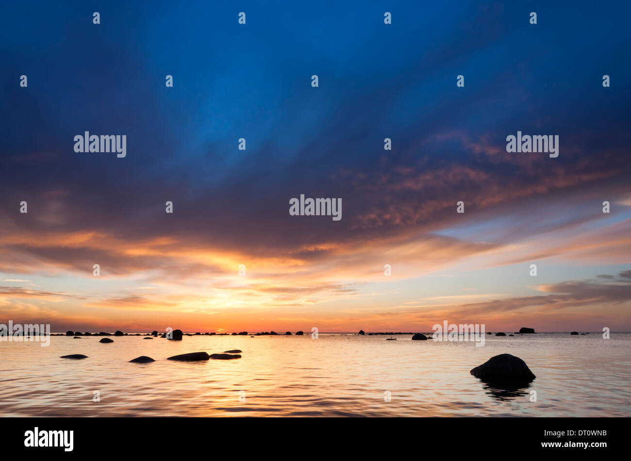 Cloudy sky with golden sunset hi-res stock photography and images - Alamy
