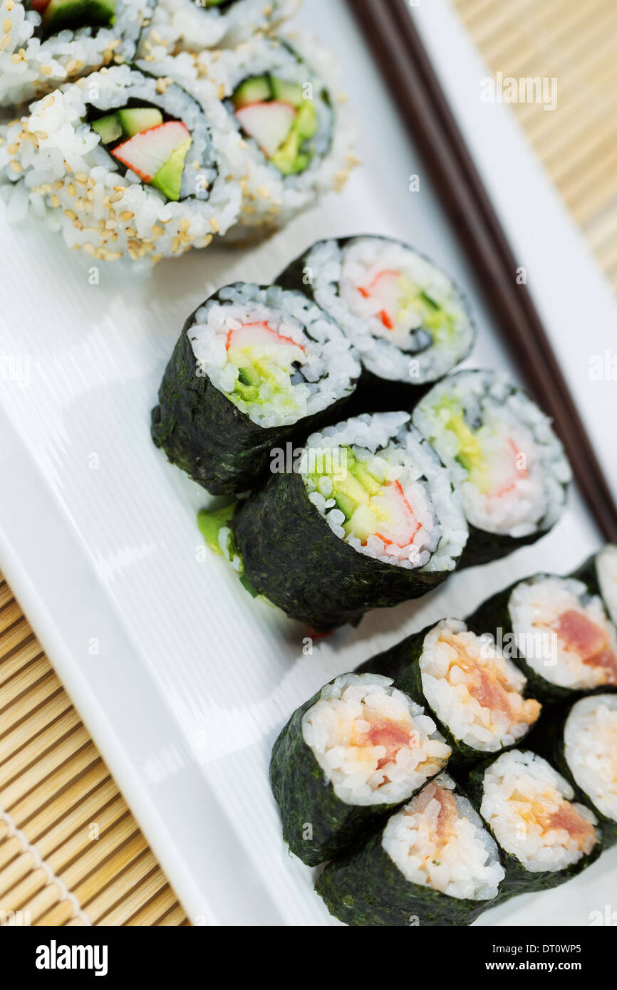 Closeup vertical top view photo of freshly handmade California sushi ...