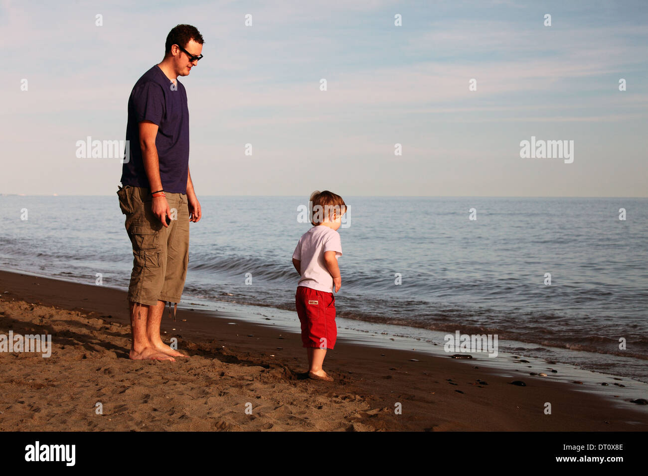 Father protecting child hi-res stock photography and images - Alamy