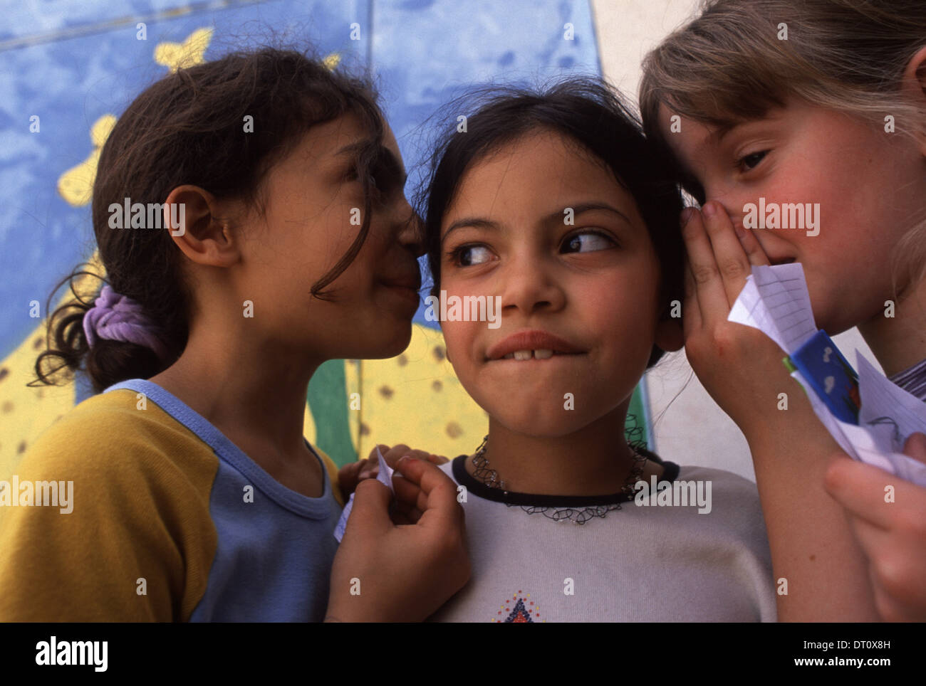 Students girls whispering girl hi-res stock photography and images - Alamy