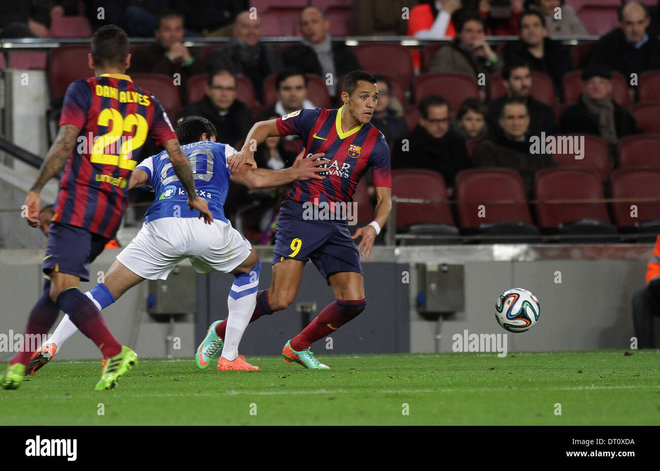 Barcelona, Spain. 05th Feb, 2014. Alexis in action challenged by Angel ...