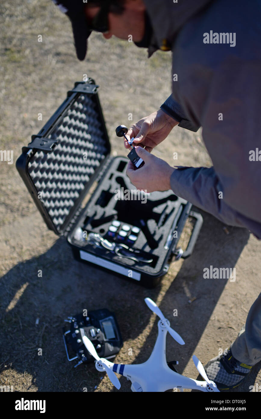 Person flying drone camera remote hi-res stock photography and images ...