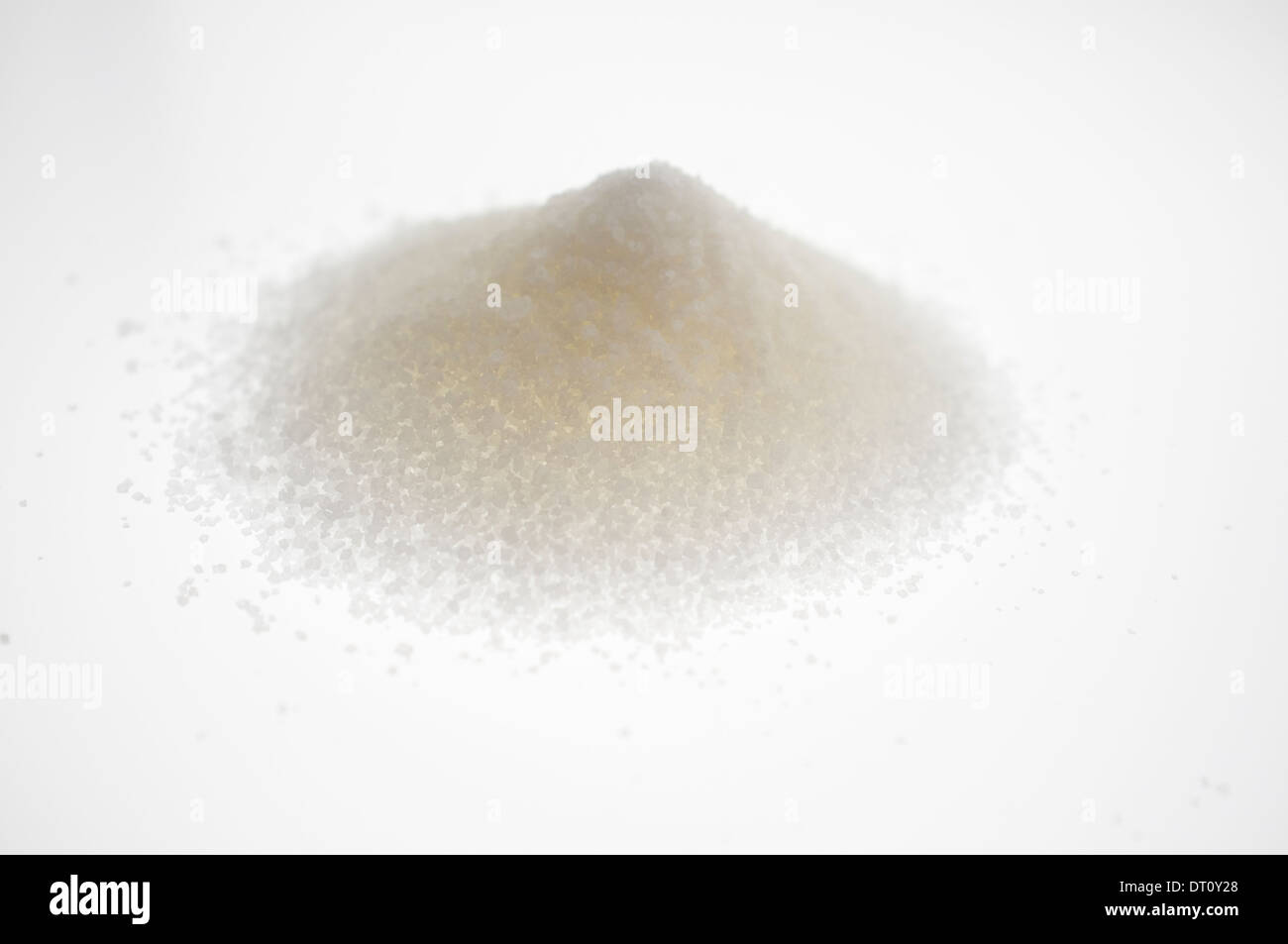 sugar granules arranged and scattered close up macro Stock Photo - Alamy