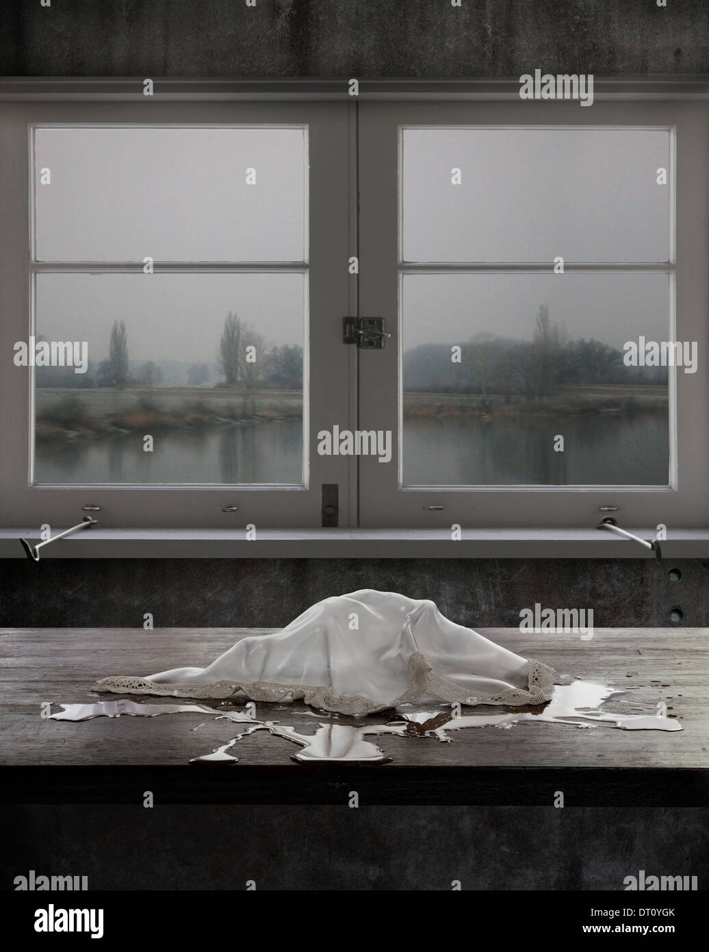 Spilled water on table, window in background Stock Photo - Alamy