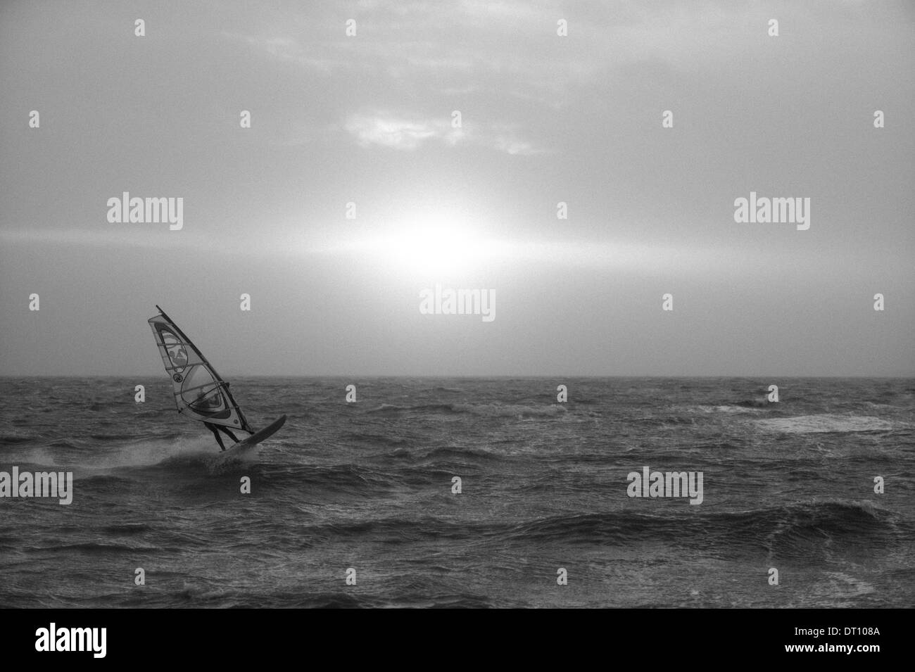 Wind surfer on a windy day in the Solent, Hampshire Stock Photo - Alamy