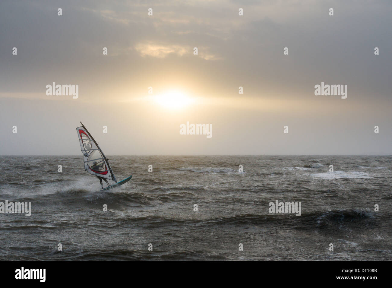 Wind surfer on a windy day in the Solent, Hampshire Stock Photo - Alamy
