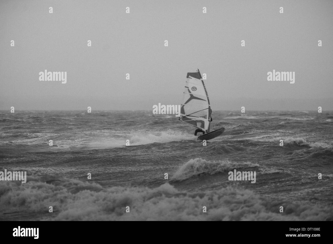 Wind surfer on a windy day in the Solent, Hampshire Stock Photo - Alamy