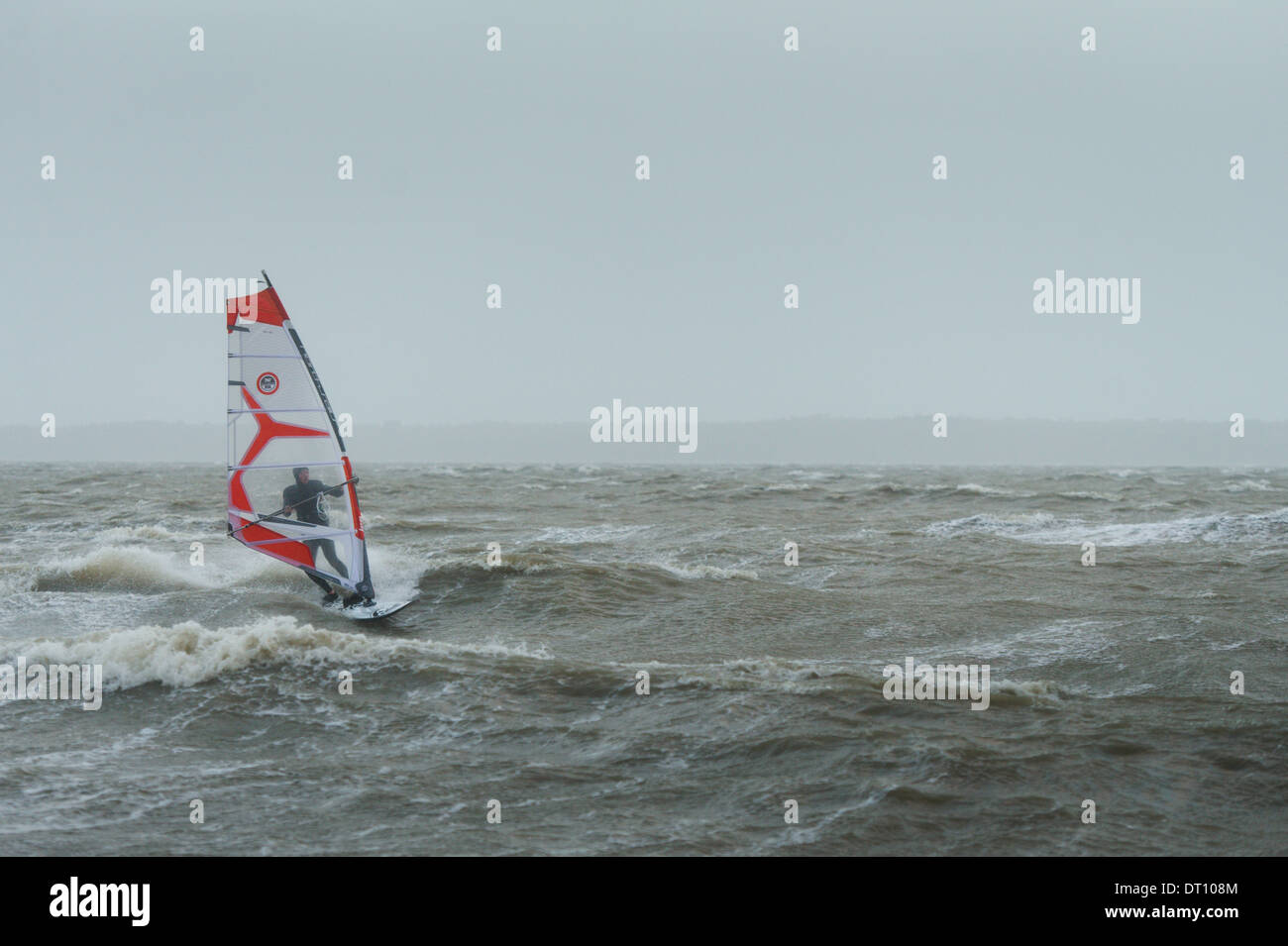 Wind surfer on a windy day in the Solent, Hampshire Stock Photo - Alamy