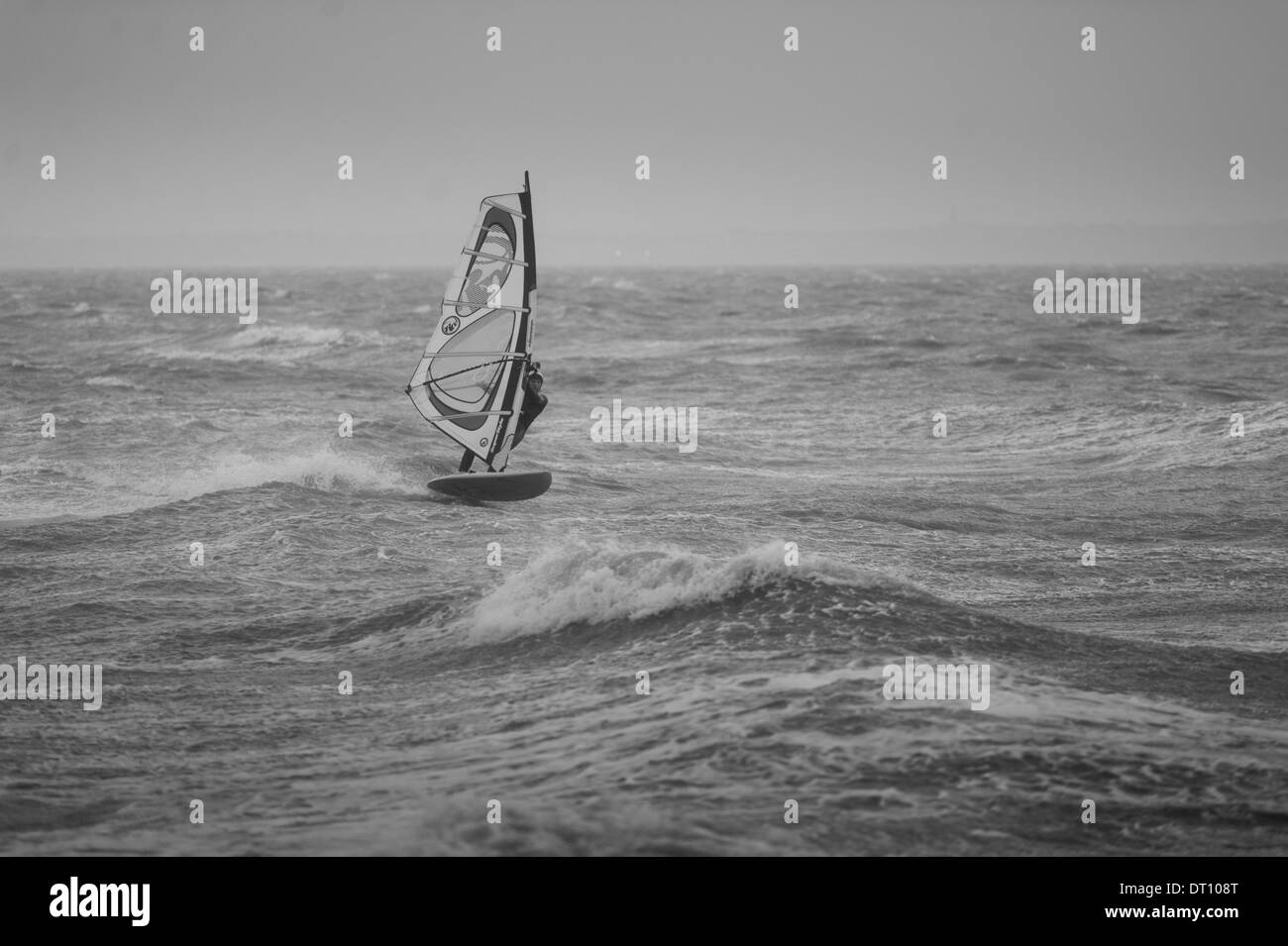 Wind surfer on a windy day in the Solent, Hampshire Stock Photo - Alamy