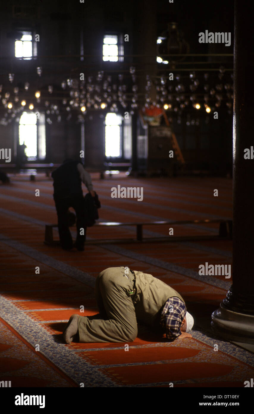 A Muslim worshiper bow in prayer inside Nuruosmaniye Mosque located in ...