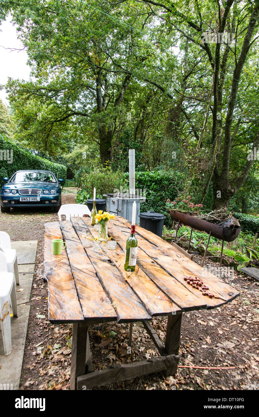 Table made with a chainsaw Stock Photo - Alamy