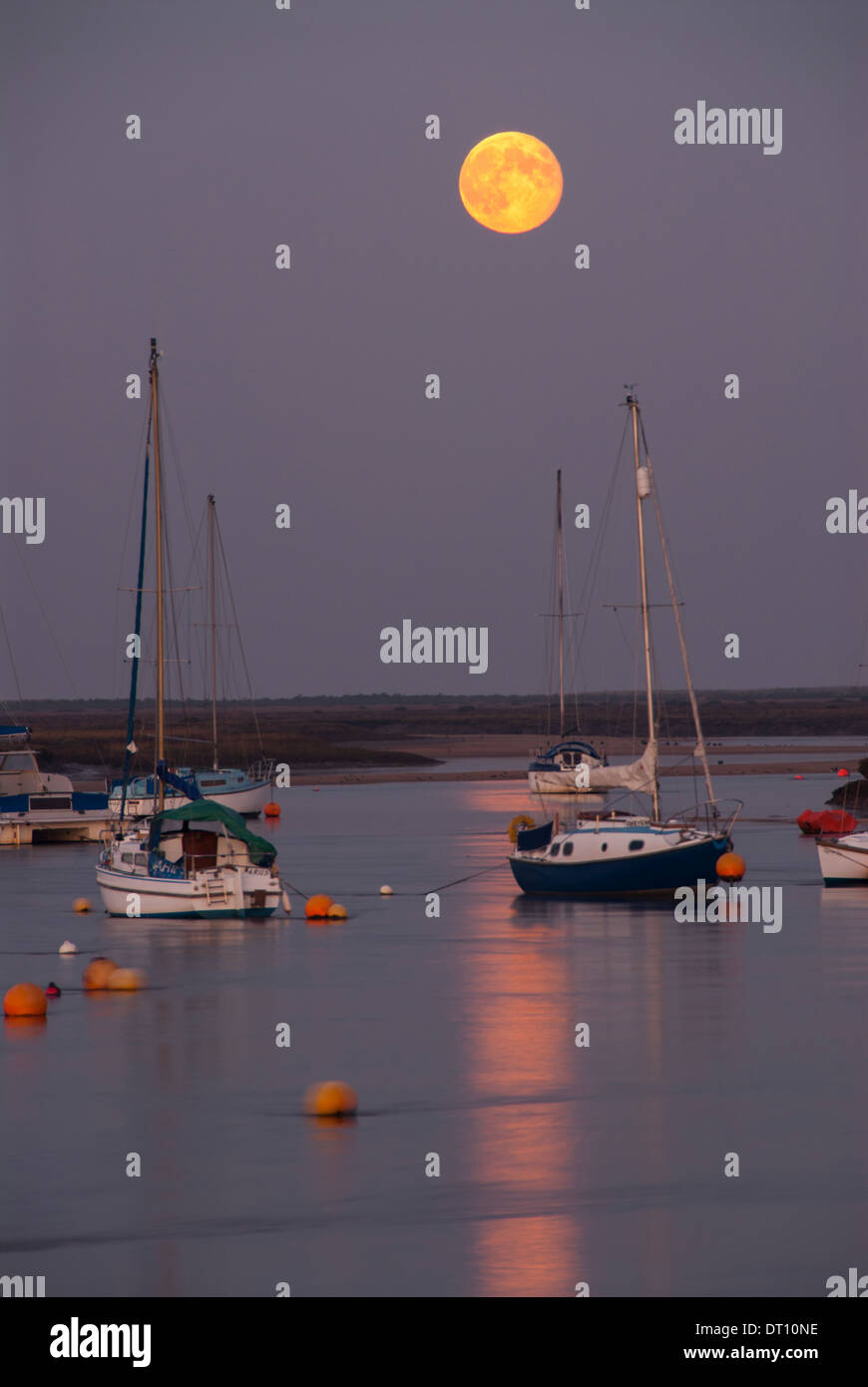 Moored pleasure craft under moonlight boats hi-res stock photography ...