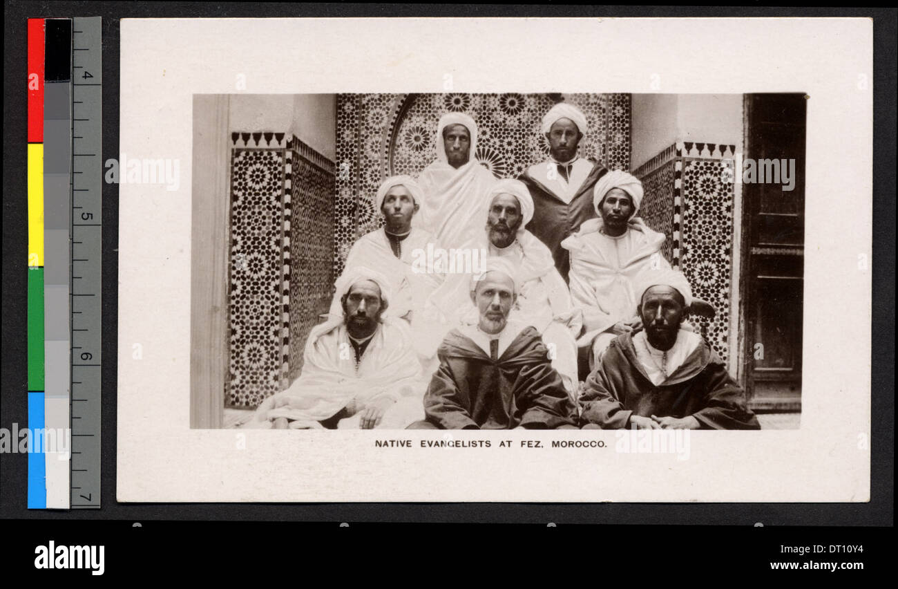 The photograph shows a group of evangelists seated indoors in Fez ...