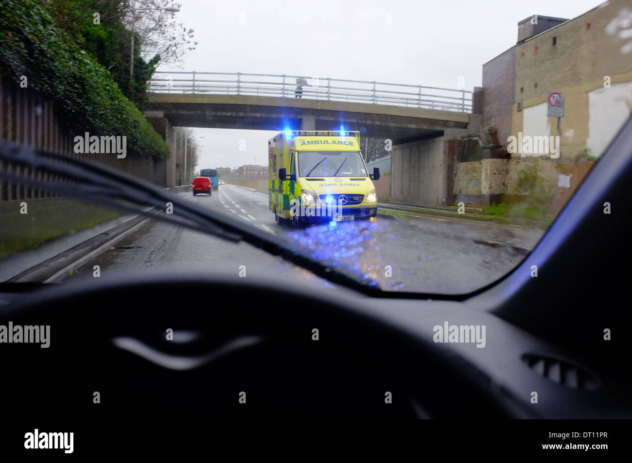 Ambulance in rain hi-res stock photography and images - Alamy