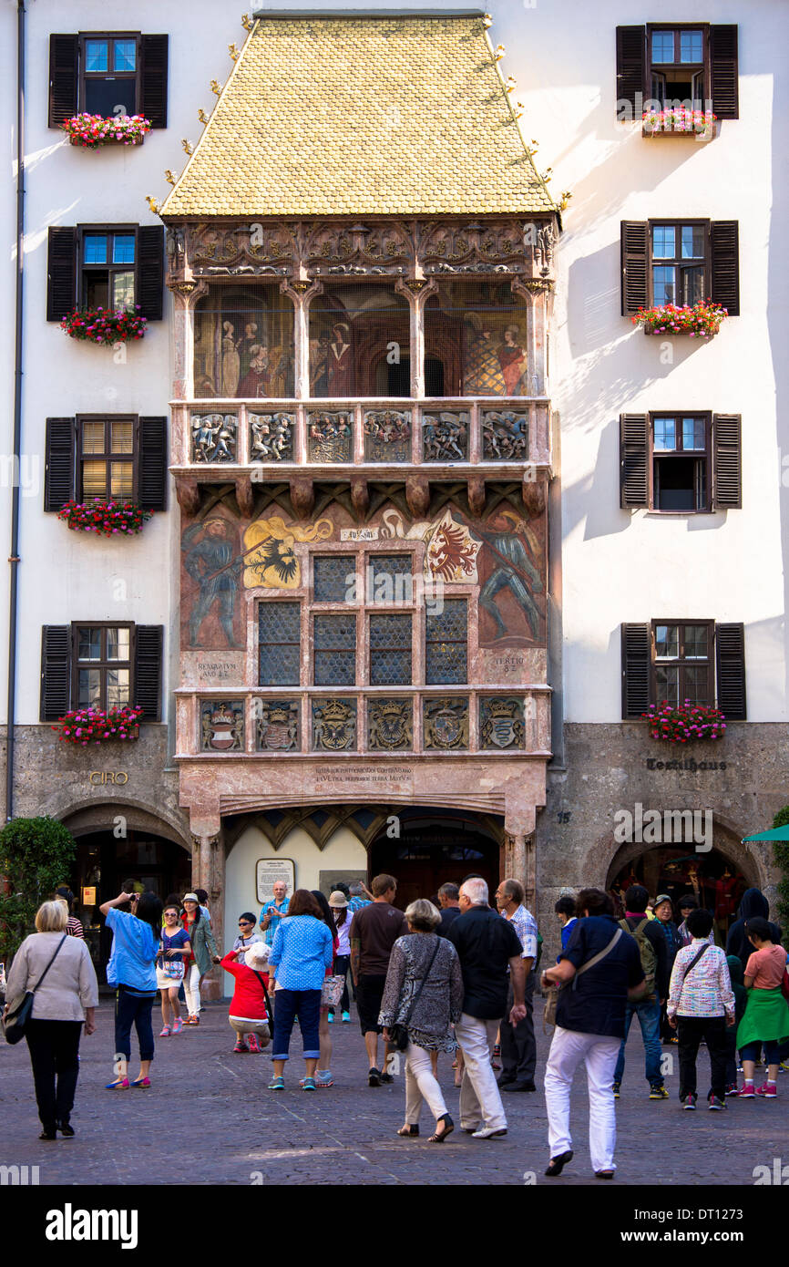 Tourists at Goldenes Dachl, Golden Roof, built 1500 of gilded copper in ...