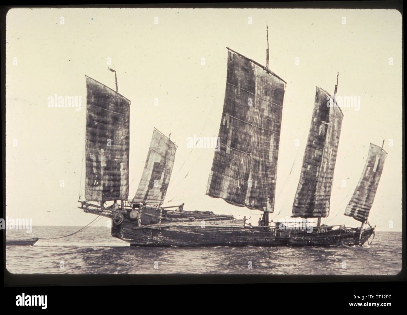 A photograph of a five-masted cargo junk in Changde, Hunan, China ...