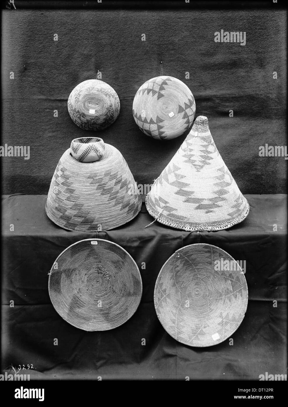 Five Native American baskets on display, around 1900. The photograph ...