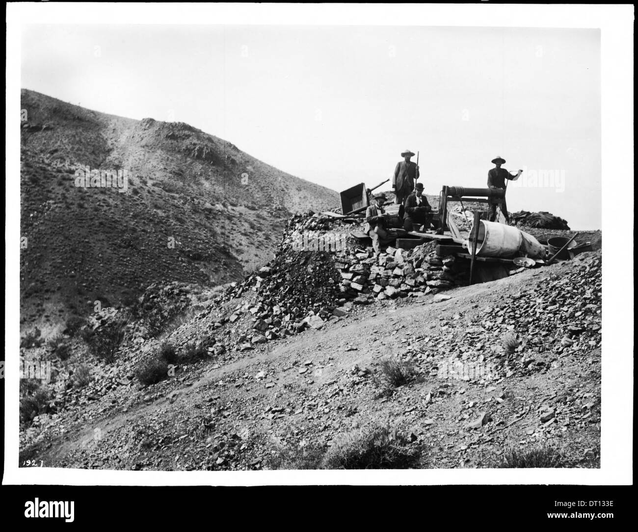 Four men are shown at the Bucket and Windlass, a prospecting shaft in ...