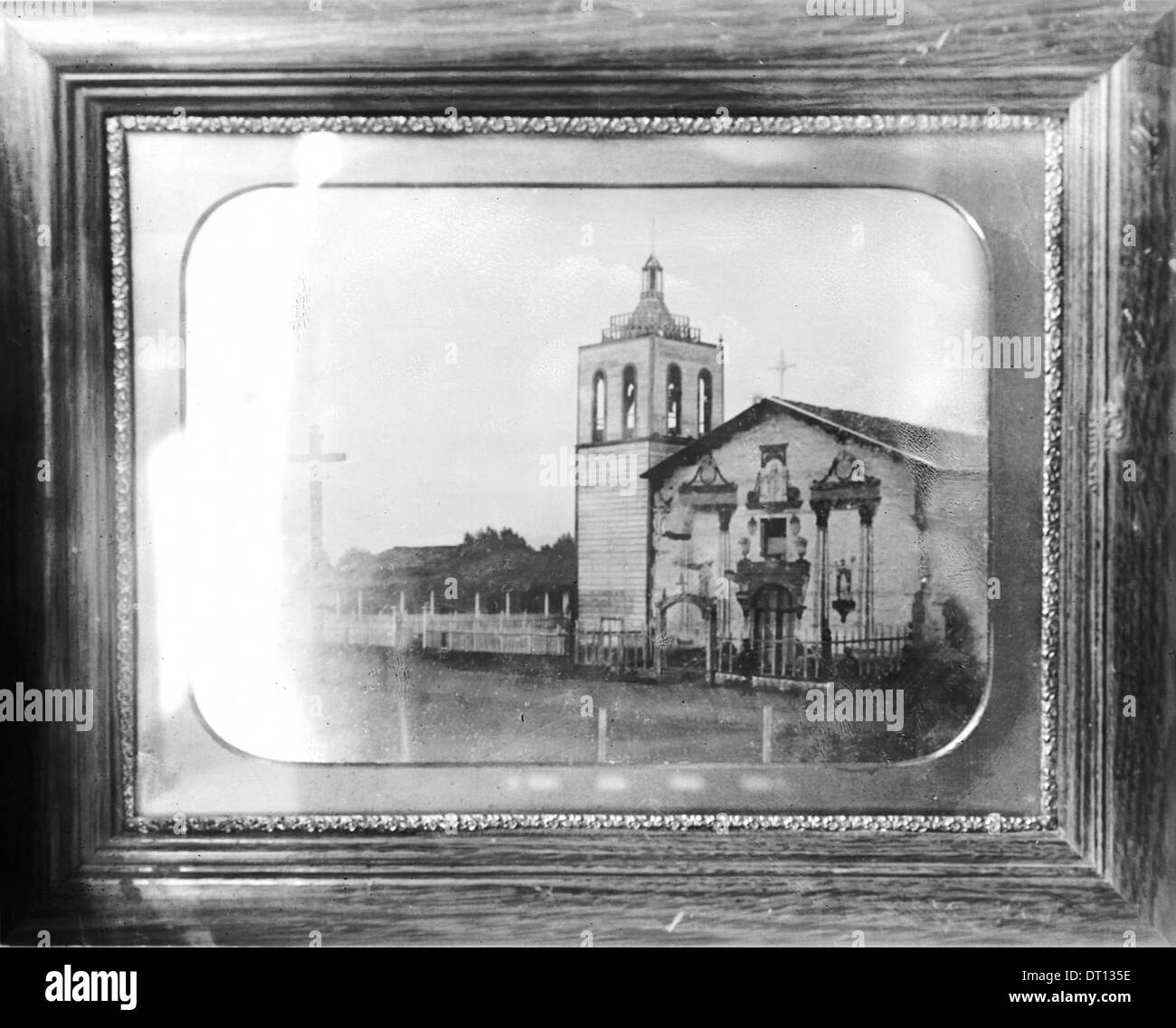A framed tintype captures Mission Santa Clara de Asis in 1875 ...