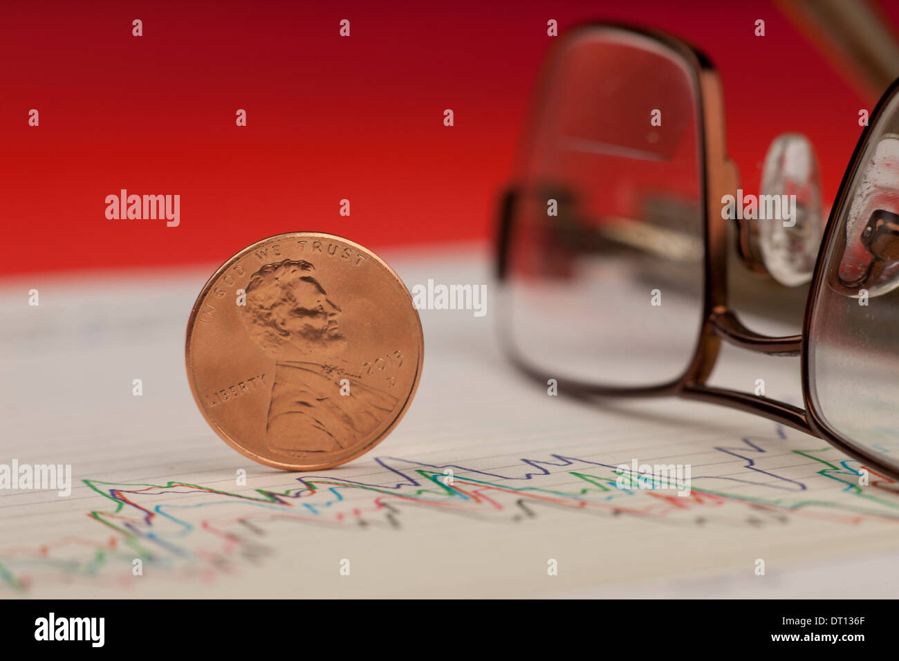 Closeup of penny on graph Stock Photo - Alamy