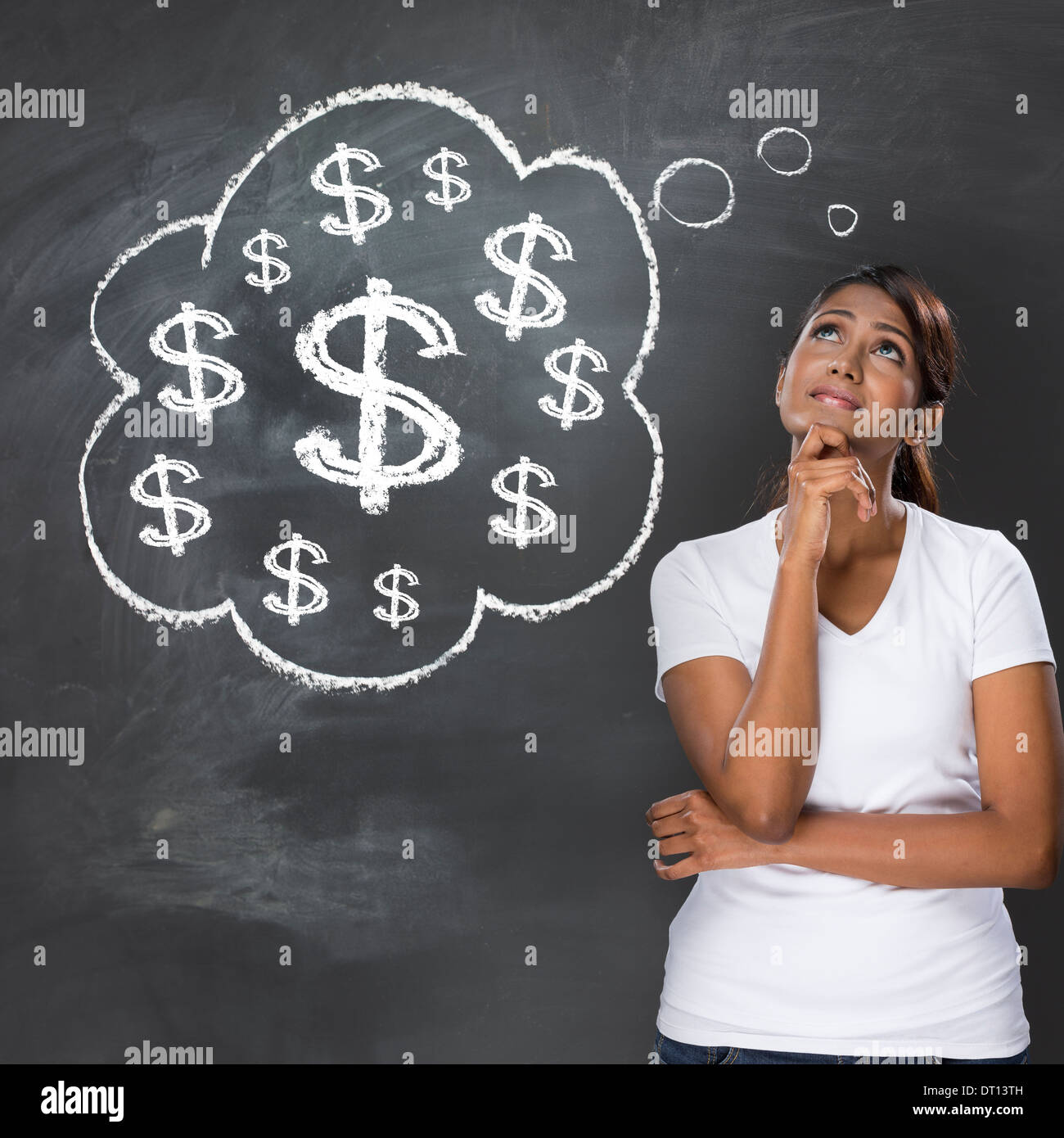 Indian woman thinking about money. She is standing under a thought ...