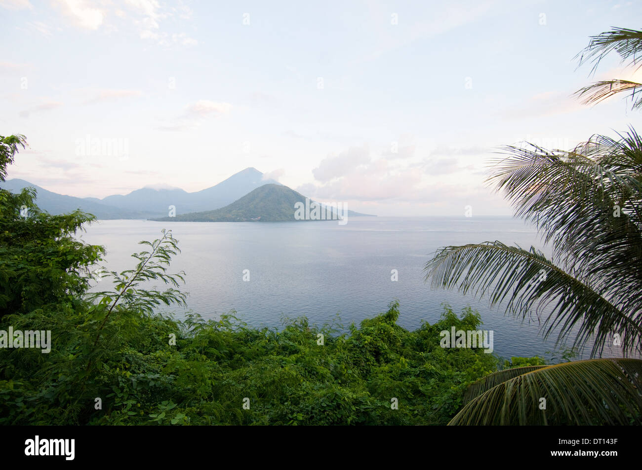 Evening view of mountain and ocean, Halmahera, Maluku Islands ...