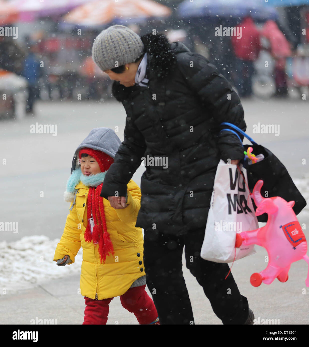 Huaibei, China's Anhui Province. 5th Feb, 2014. Passengers walk at the ...