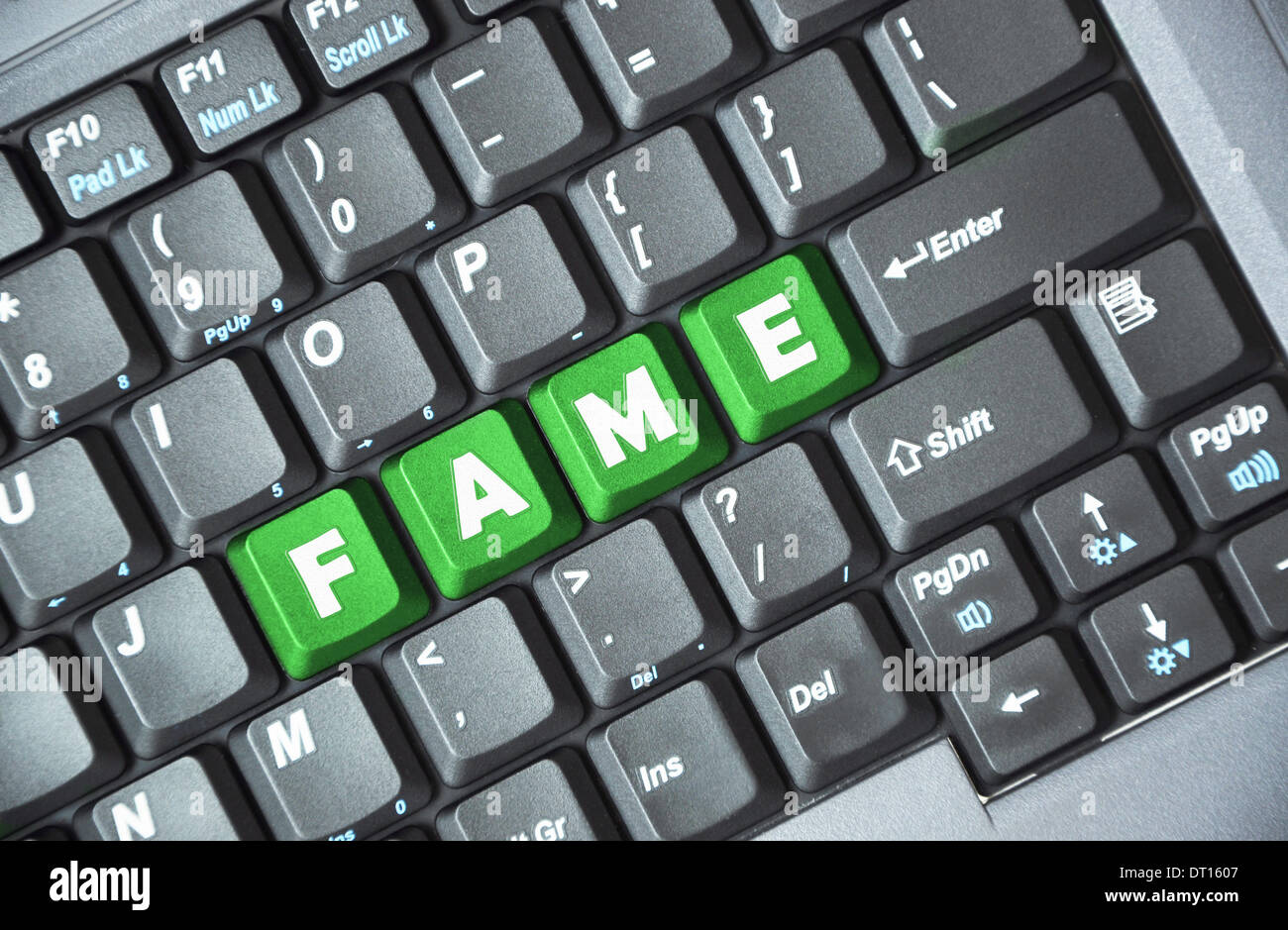 Fame on keyboard Stock Photo - Alamy