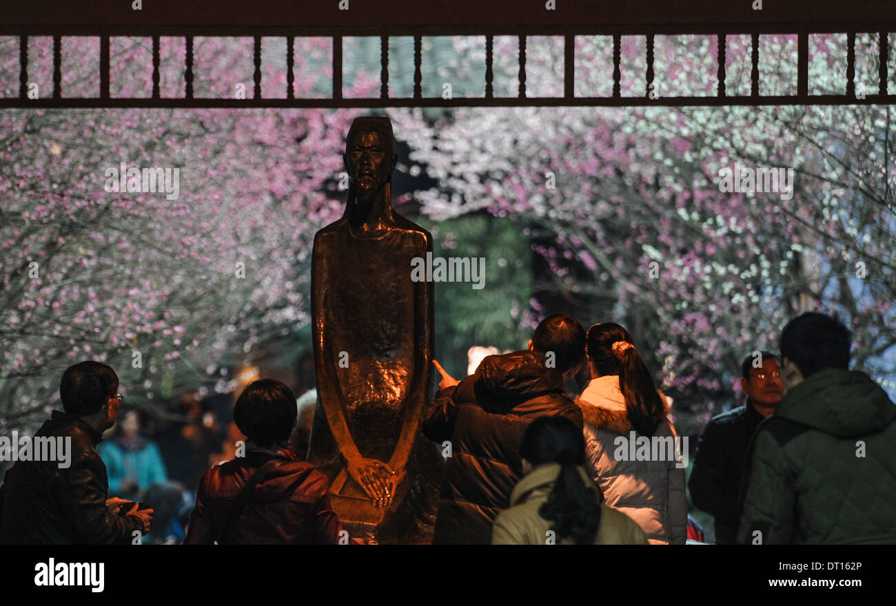 Chengdu, Sichuan, China. 06th Feb, 2014. People pay homage to the ...