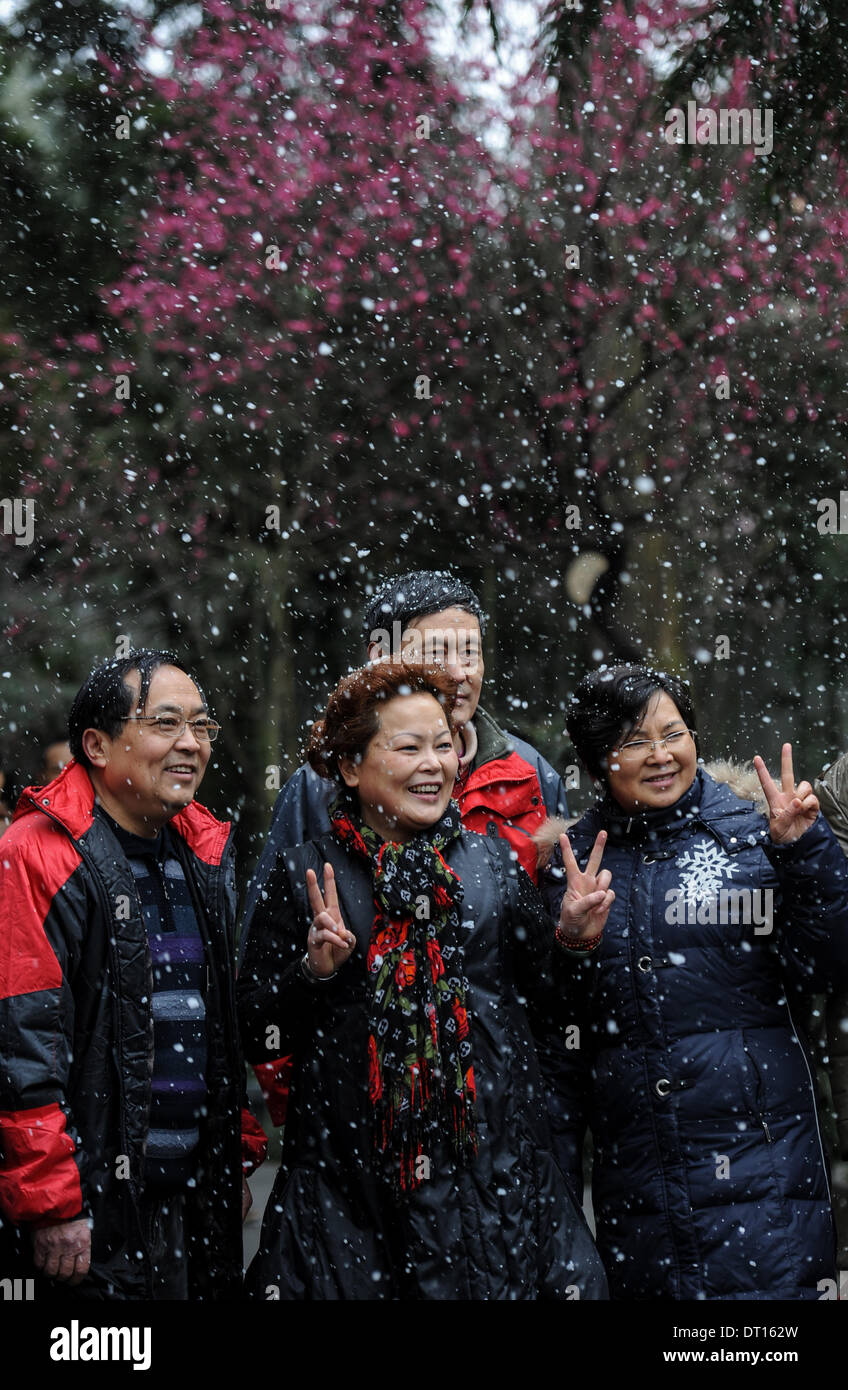 Chengdu, Sichuan, China. 06th Feb, 2014. People pose for a photo at the ...
