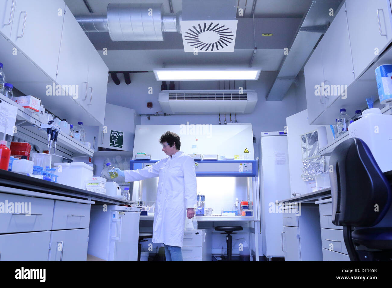 scientist in a biological lab working Caucasian woman Stock Photo - Alamy