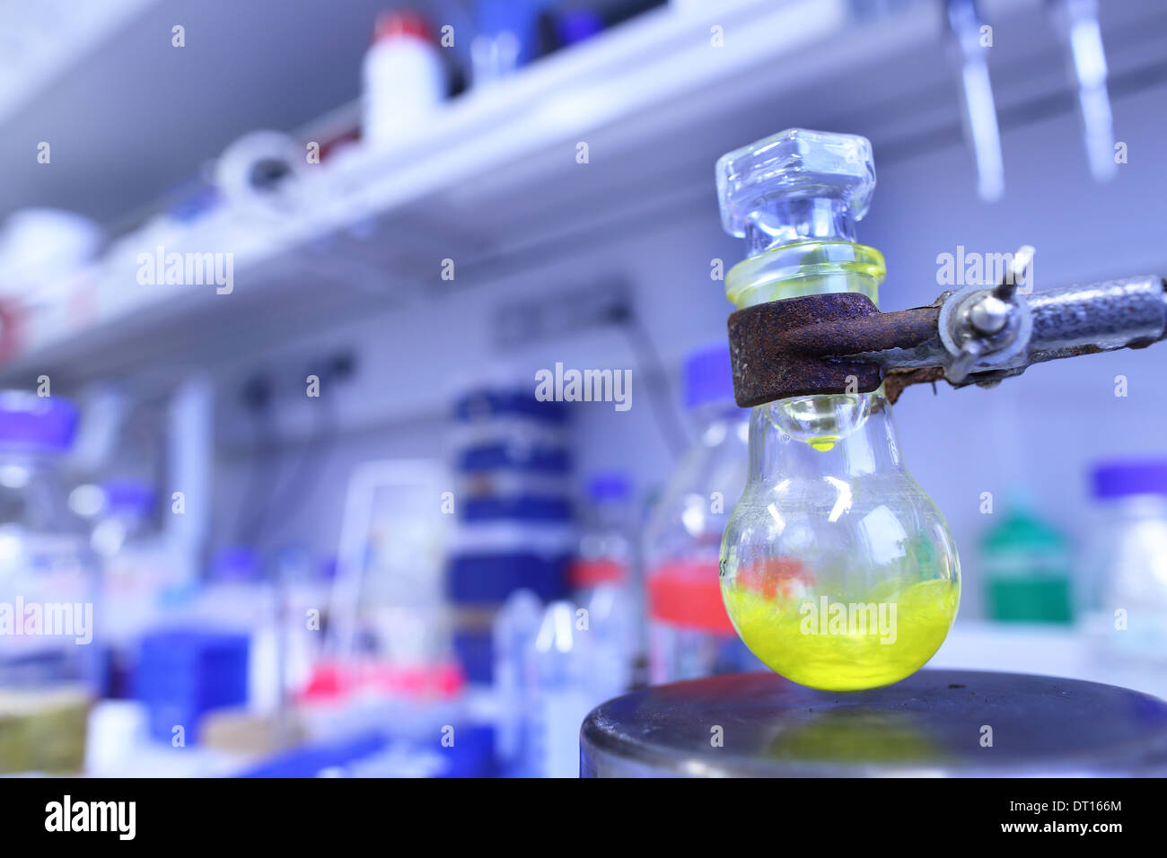 yellow glass bulb as lab tool in a biological lab Stock Photo - Alamy