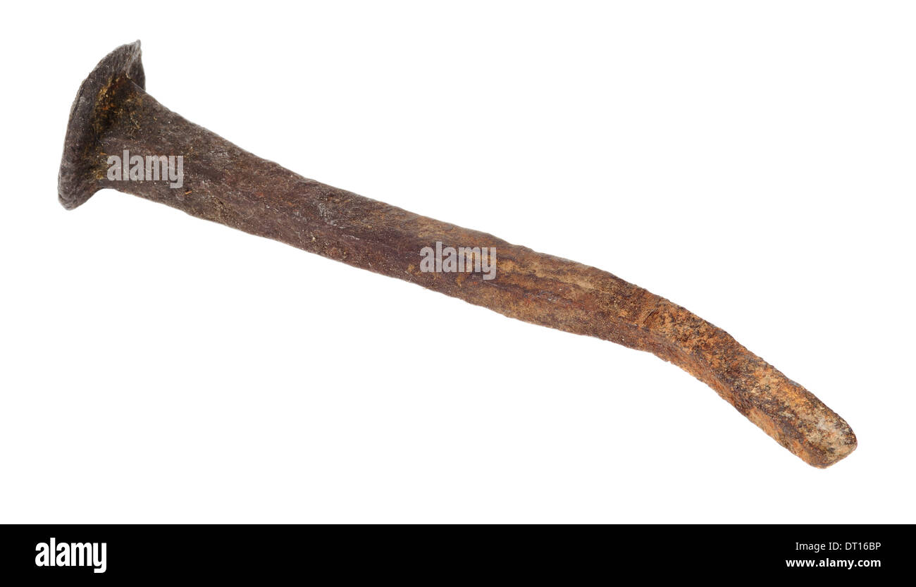 One traditional, hand-made, rusty, corroded, old, big nail isolated on ...