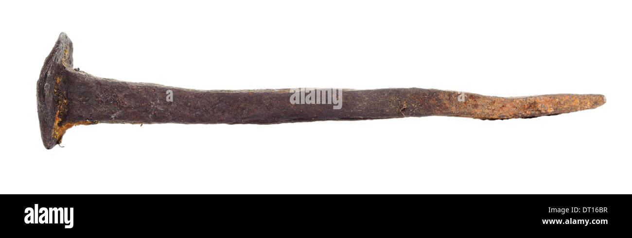 One traditional, hand-made, rusty, corroded, old, big nail isolated on ...