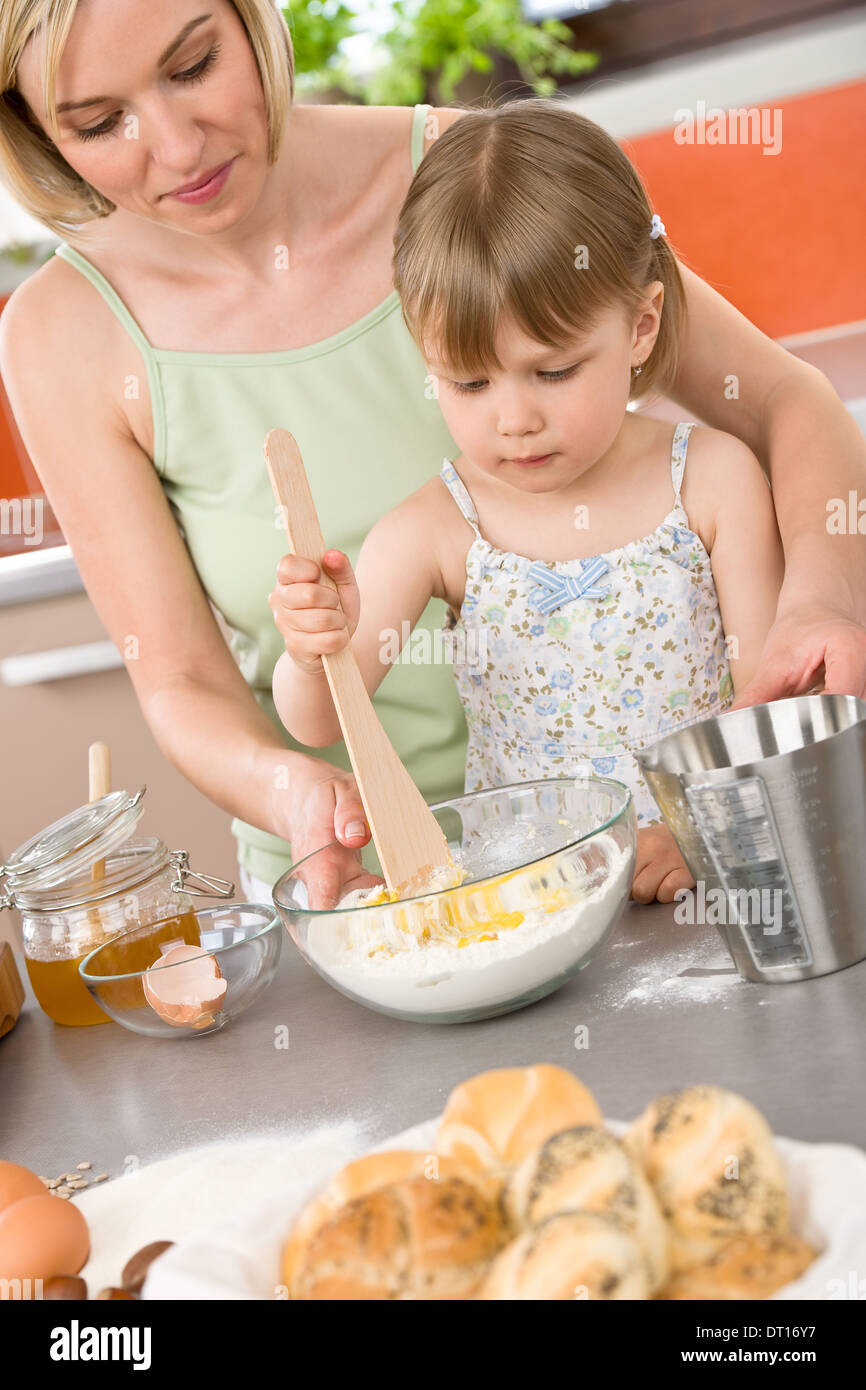 Child mother baking honey hi-res stock photography and images - Alamy