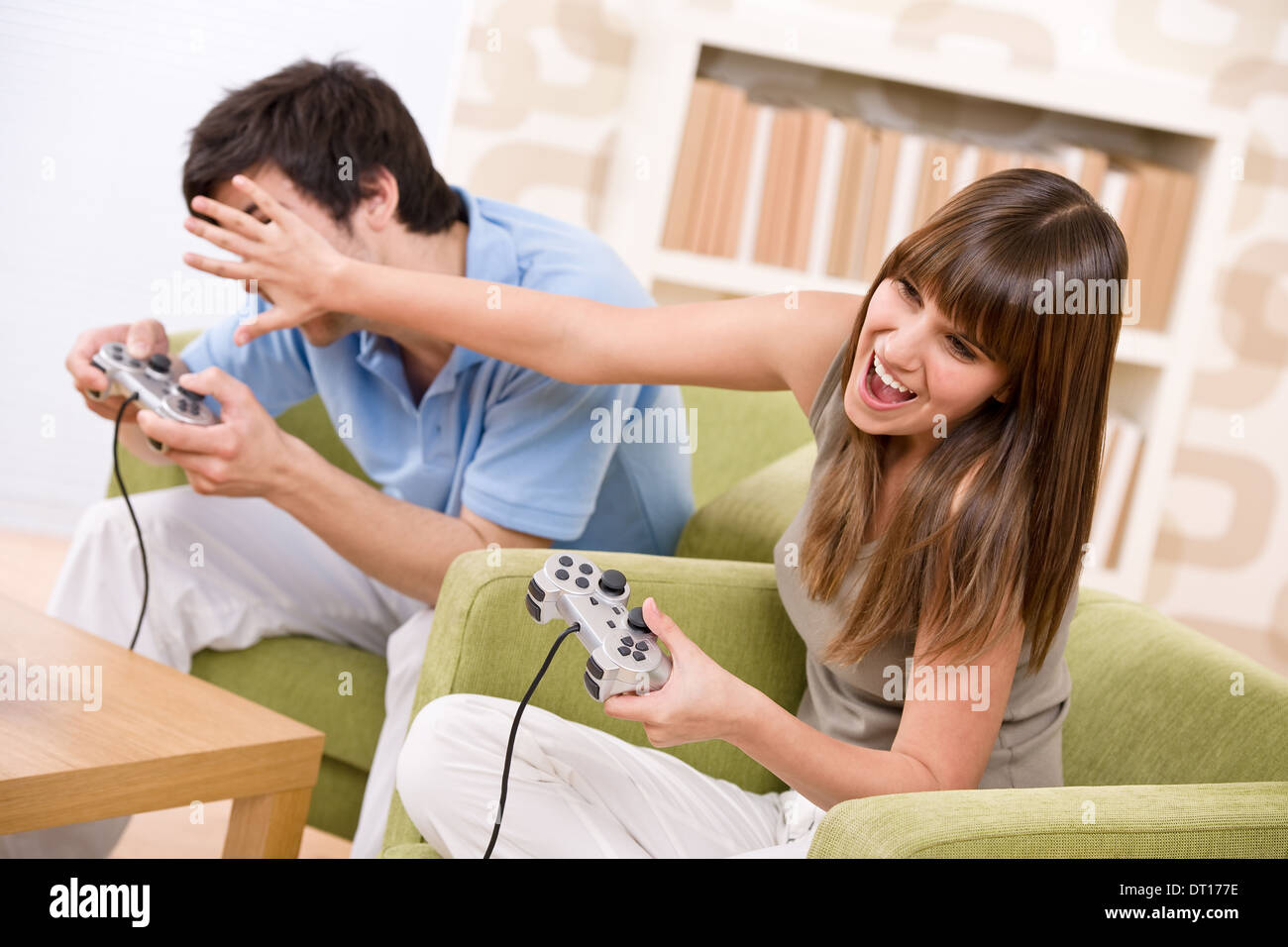 Student - happy teenagers playing video game Stock Photo - Alamy