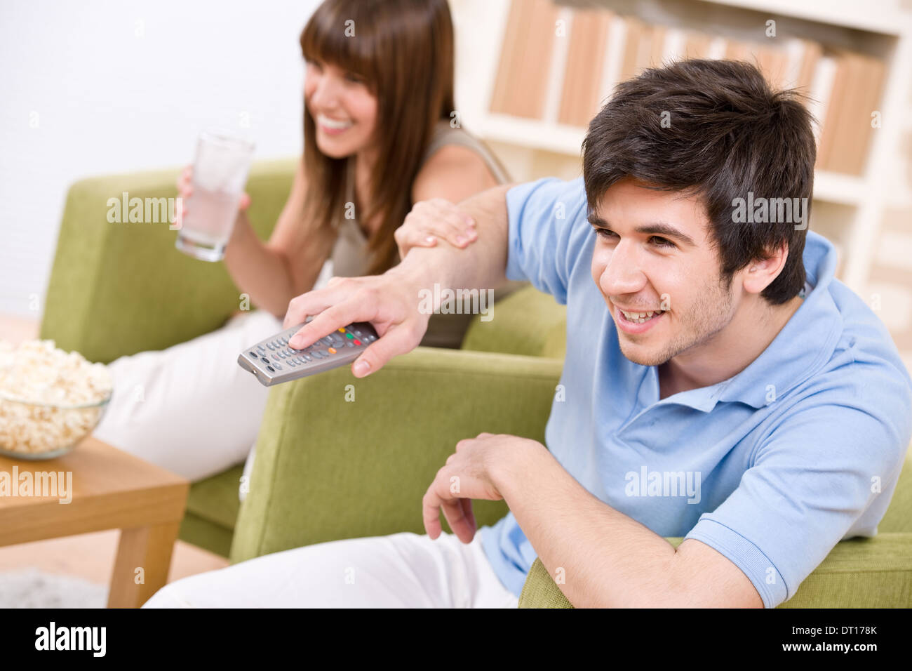 Student - happy teenagers watching television Stock Photo - Alamy