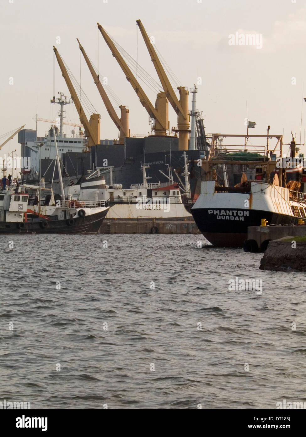durban harbour sunset, car exports, tugs, ships Stock Photo - Alamy