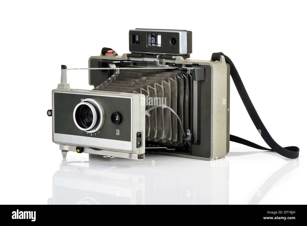 Vintage instant camera and his reflection on white background Stock ...