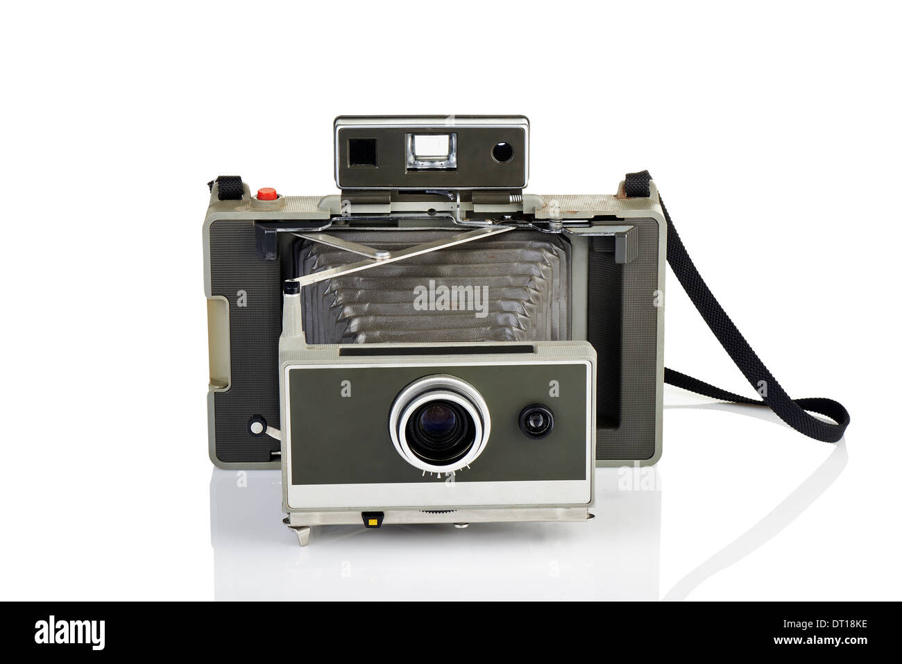 Vintage instant camera and his reflection on white background Stock ...