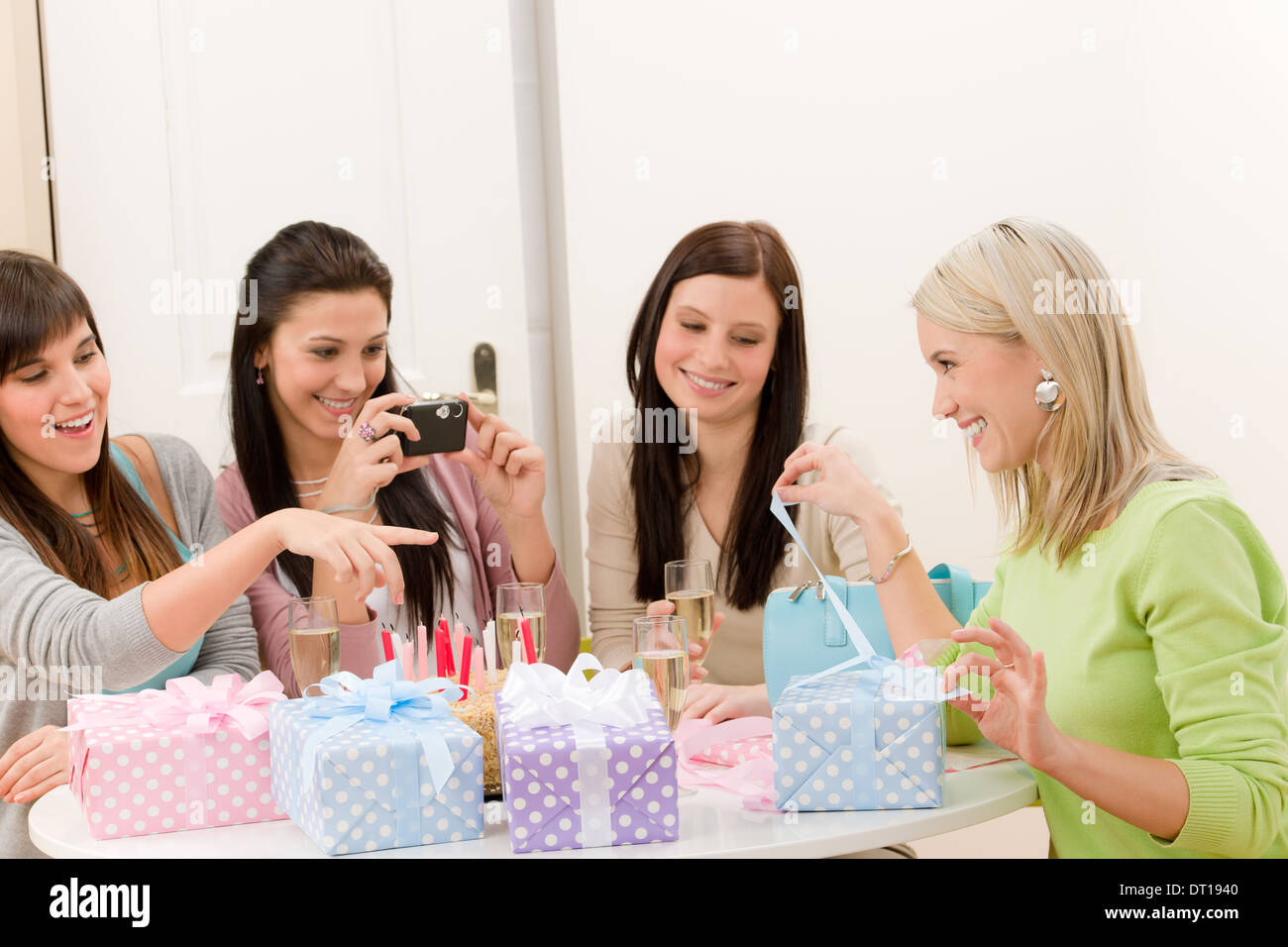 Woman take birthday party cake hi-res stock photography and images - Alamy