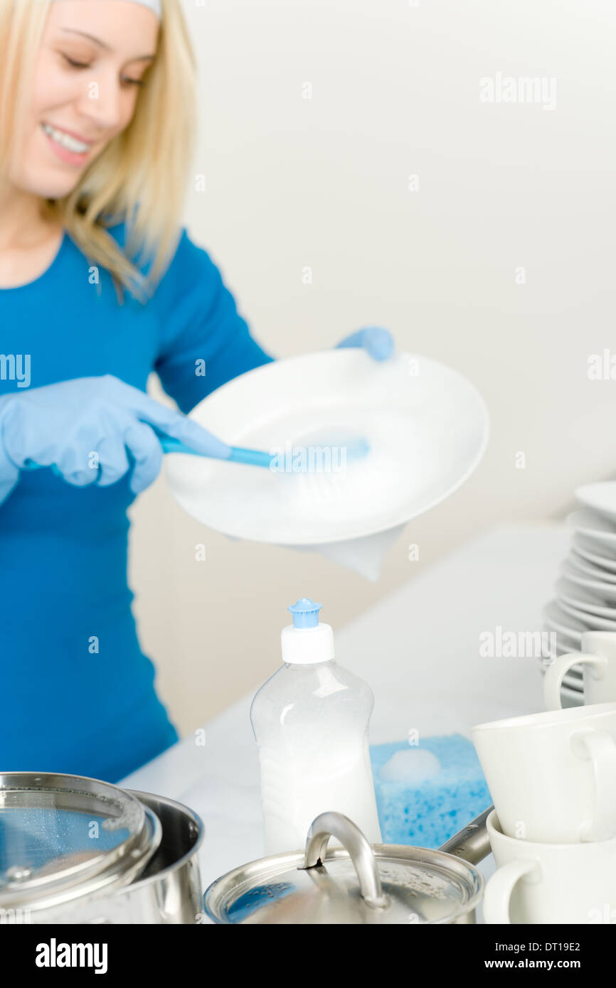 Modern kitchen - happy woman washing dishes Stock Photo - Alamy