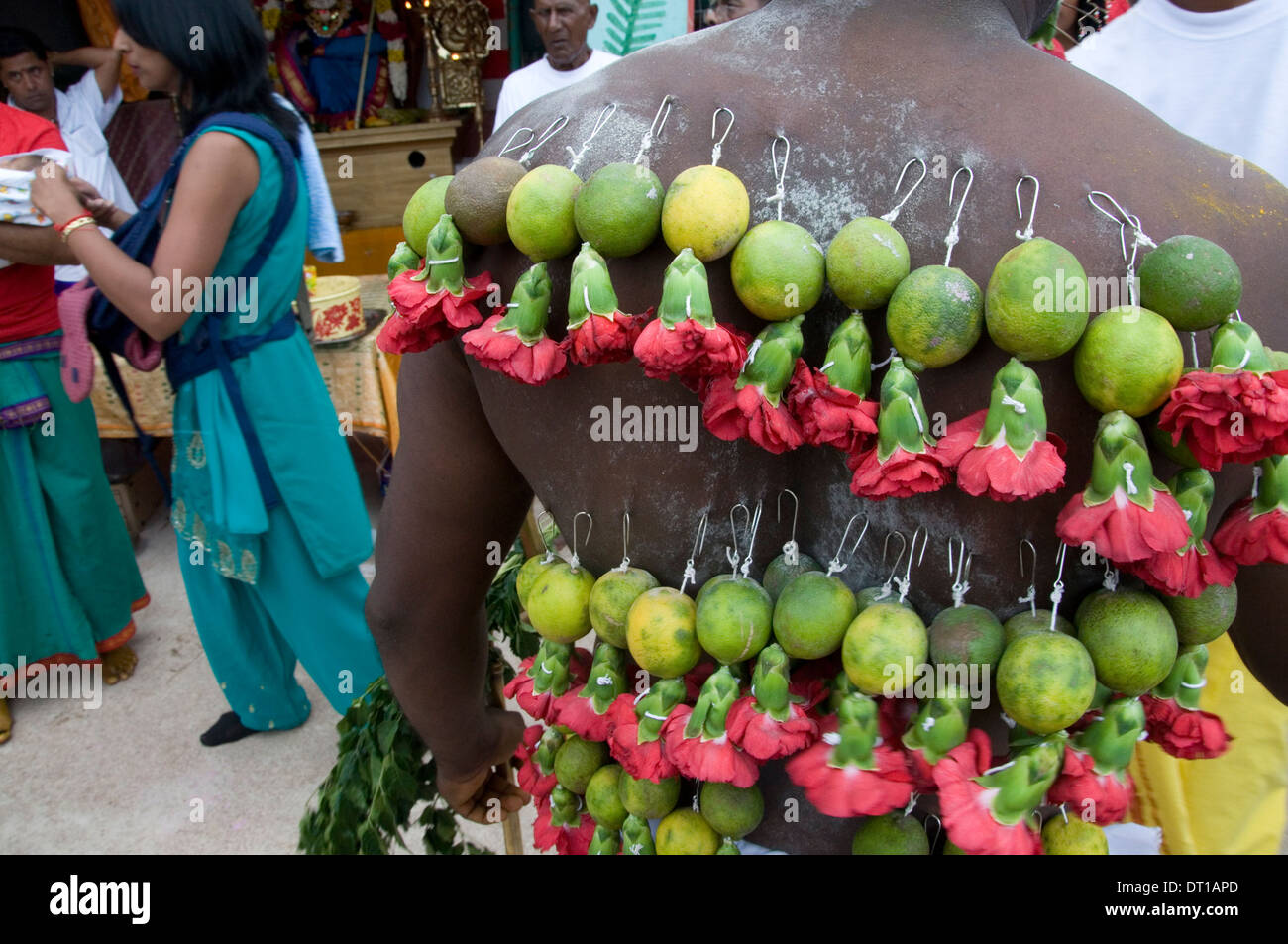 HINDU CULTURE FIRE WALKING BODY PIERCING CARRYING OF DIETYS, HONOUR OF ...