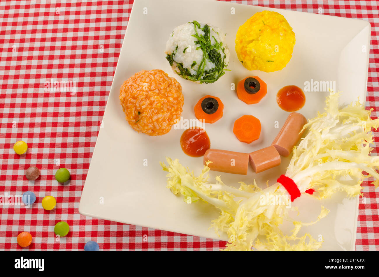 Smiling clown, kid food served in a creative way Stock Photo - Alamy