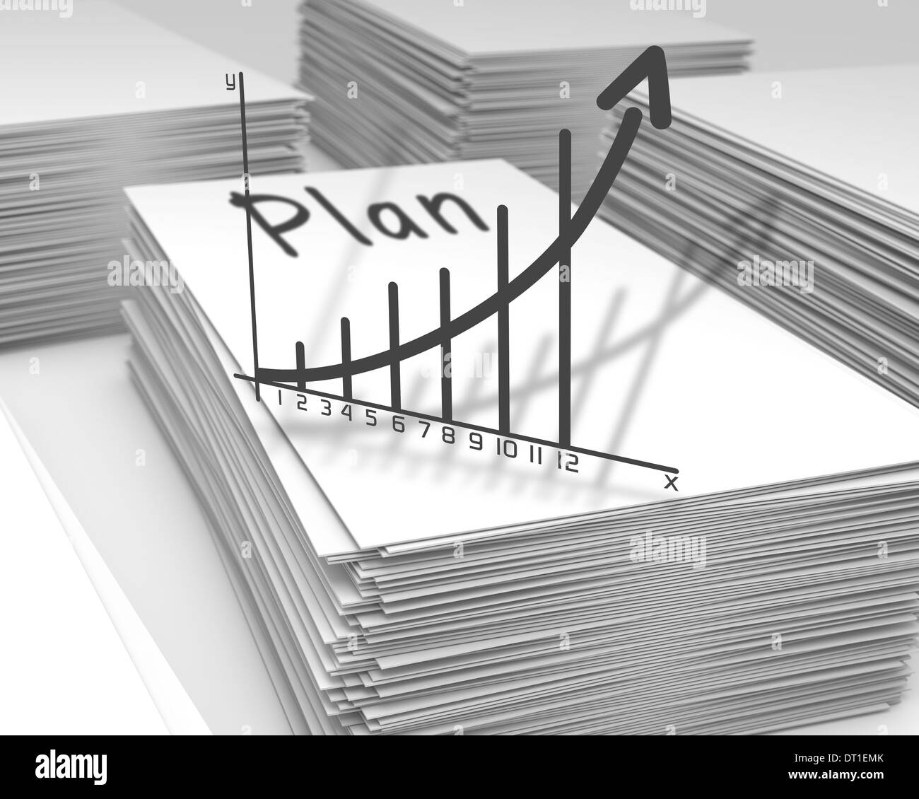 Stacks of paper with a plan graph Stock Photo - Alamy