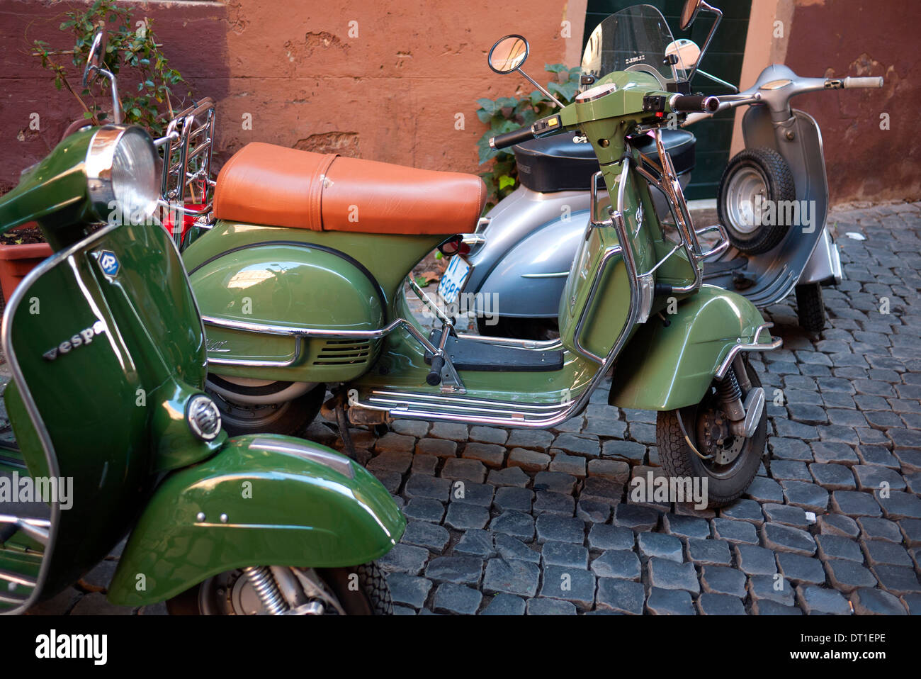 Vespa scooters parked in Rome, Italy Stock Photo - Alamy