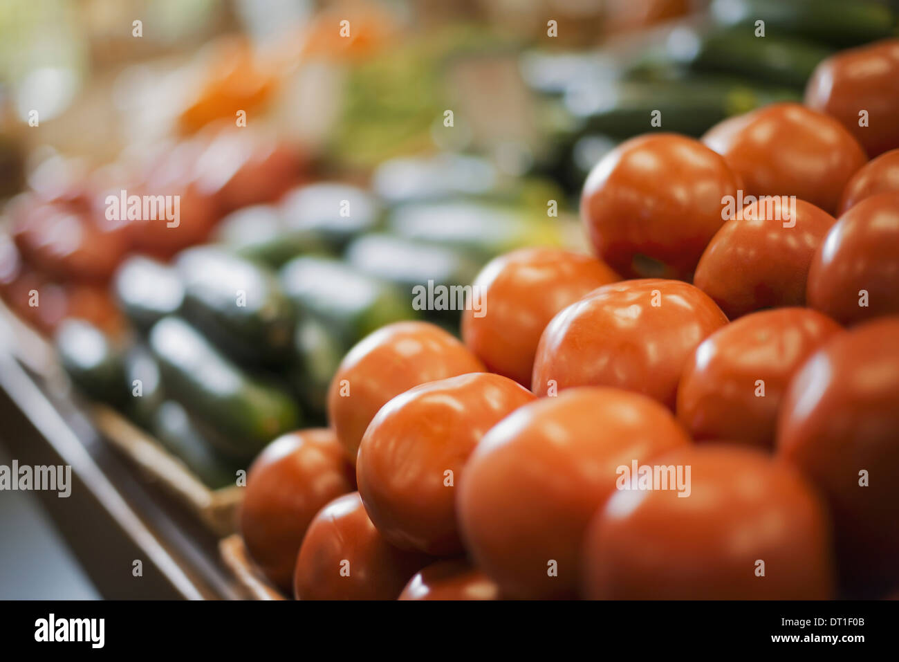 A farm stand display of fresh produce Tomatoes and cucumbers Stock ...